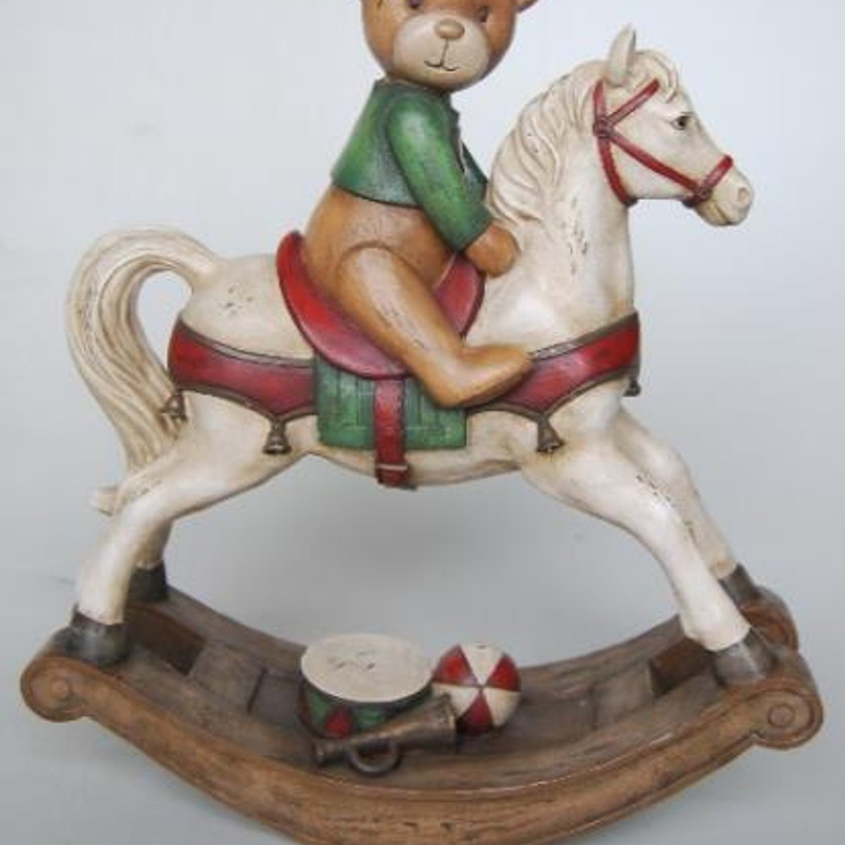 Teddy bear riding on a rocking horse - Bunnings Australia