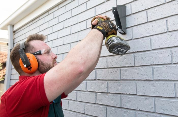 How To Install a Wall-Mounted Clothesline - Bunnings Australia