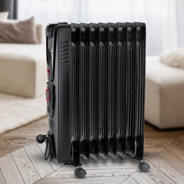Arlec 1500W 7 Fin Oil Heater With 24 Hour Timer - Bunnings New Zealand
